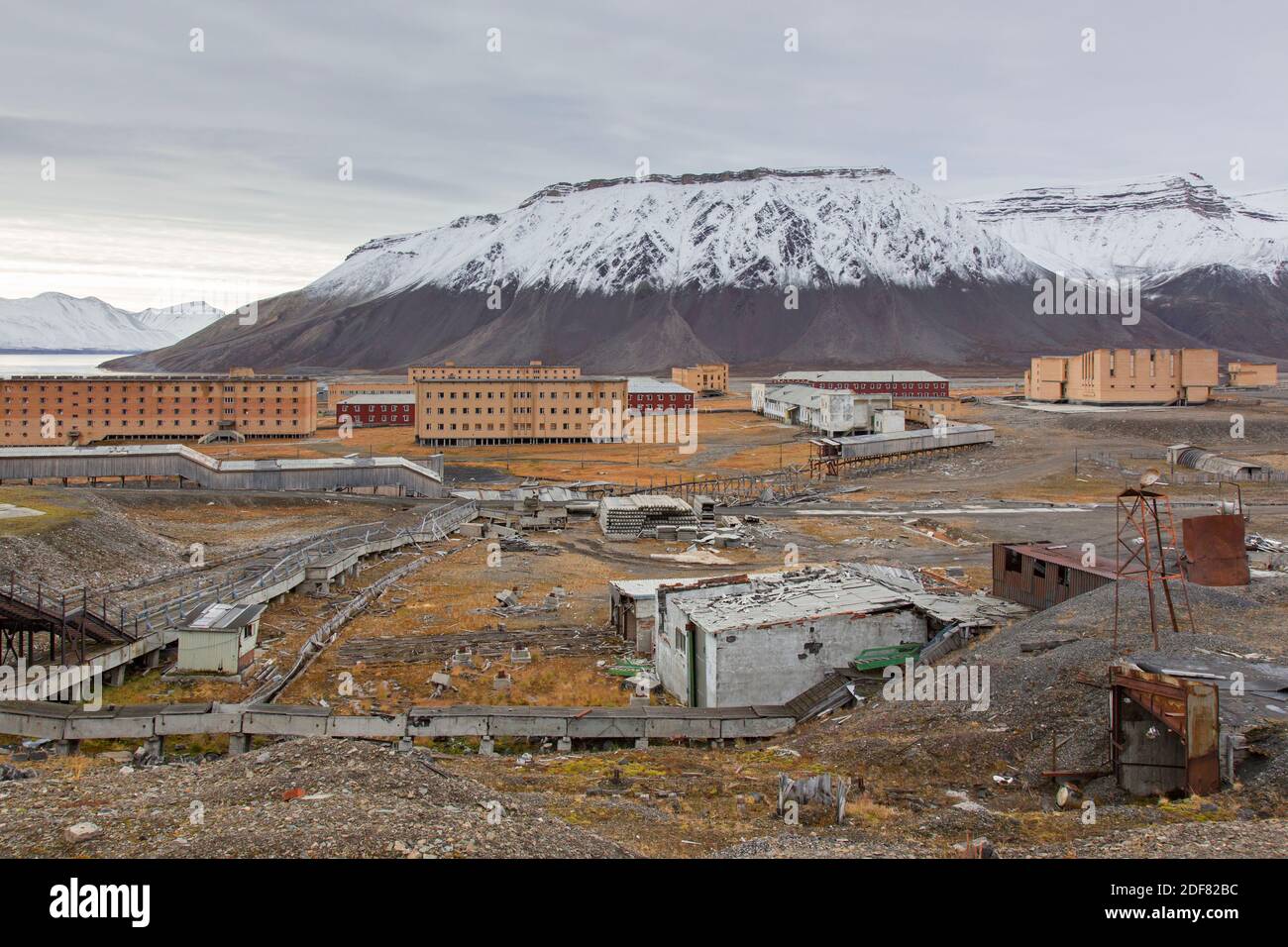 Derelict mining buildings at Pyramiden, abandoned Soviet coal mining ...