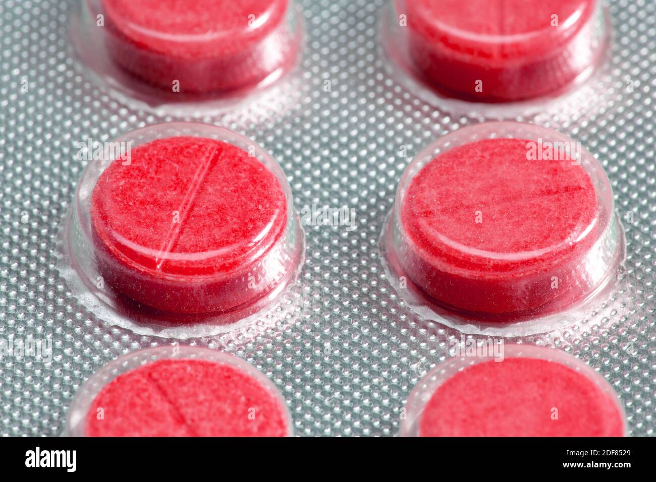 red tablets in a close-up blister Stock Photo - Alamy