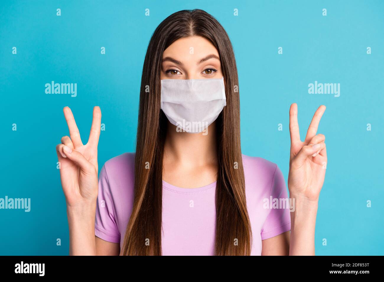 Photo portrait of adorable woman showing two v-signs wearing white face ...