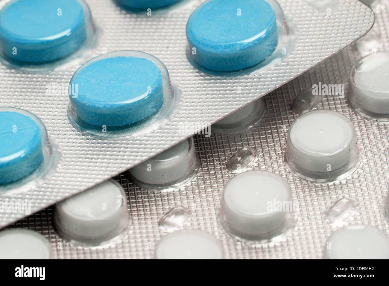 blue tablets in a close-up blister Stock Photo - Alamy
