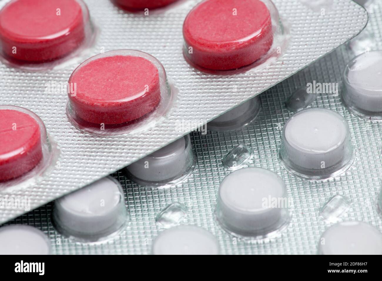 red tablets in a close-up blister Stock Photo - Alamy
