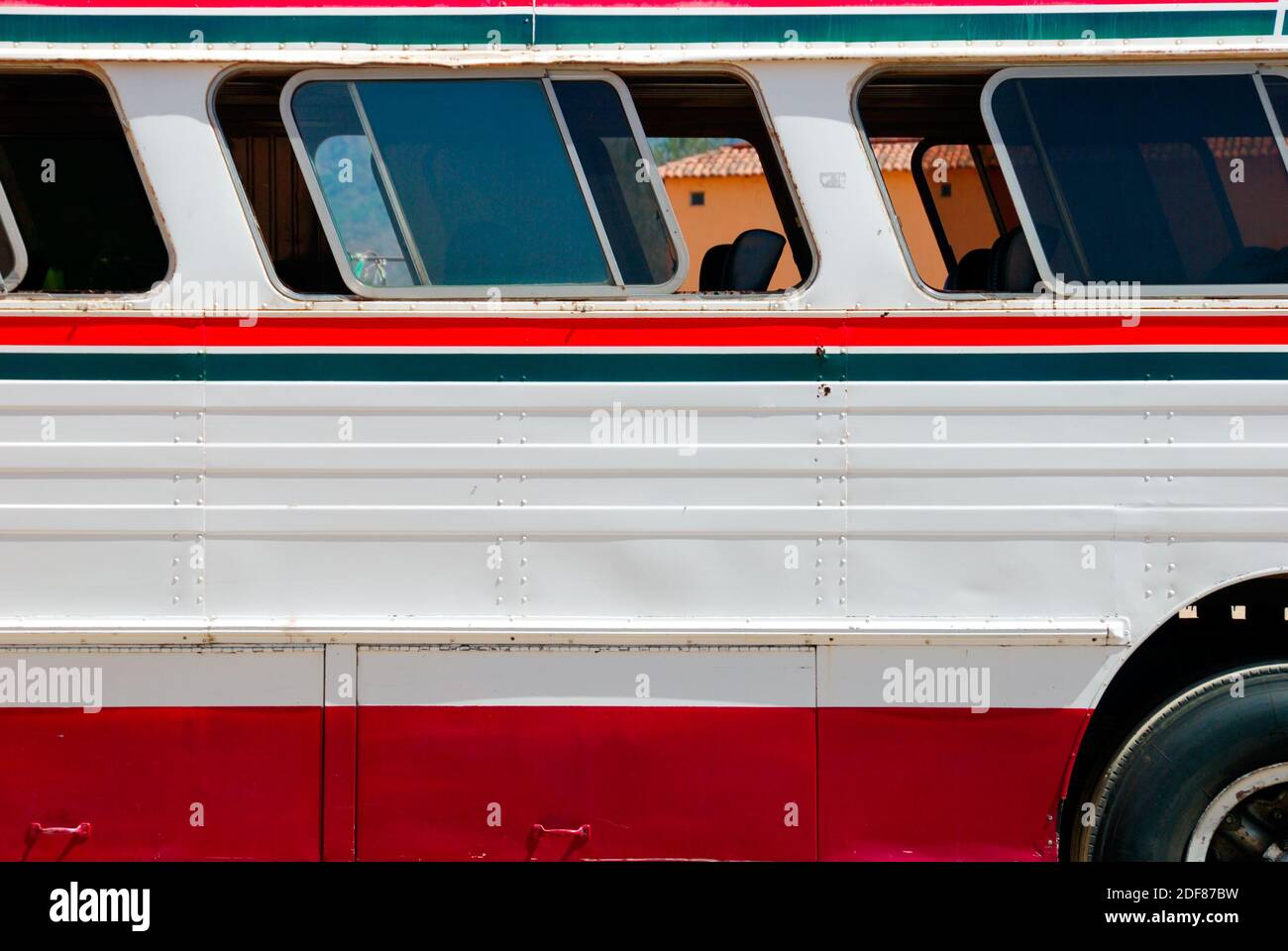 Side view of typical mexican bus parked in small village Stock Photo ...
