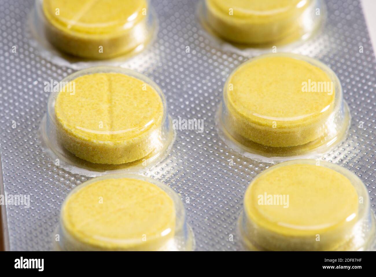 yellow tablets in a close-up blister Stock Photo - Alamy