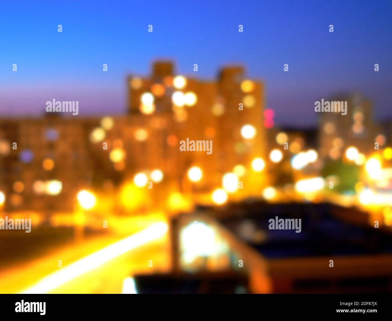Blurred night view of housing estates in the big city in the night ...