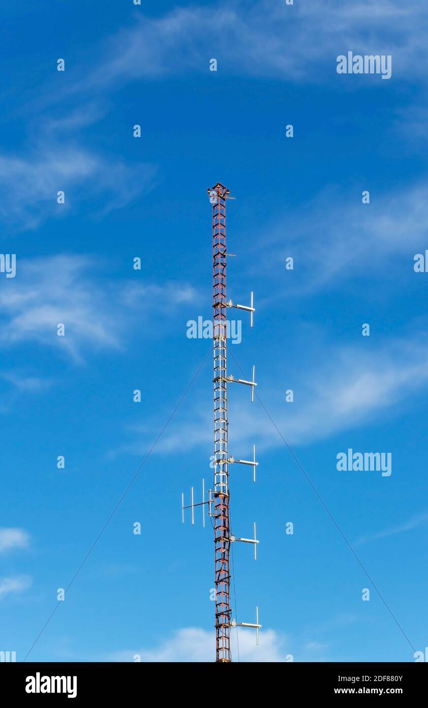 Aerial antennas on the metallic mast. Communication equipment on the ...