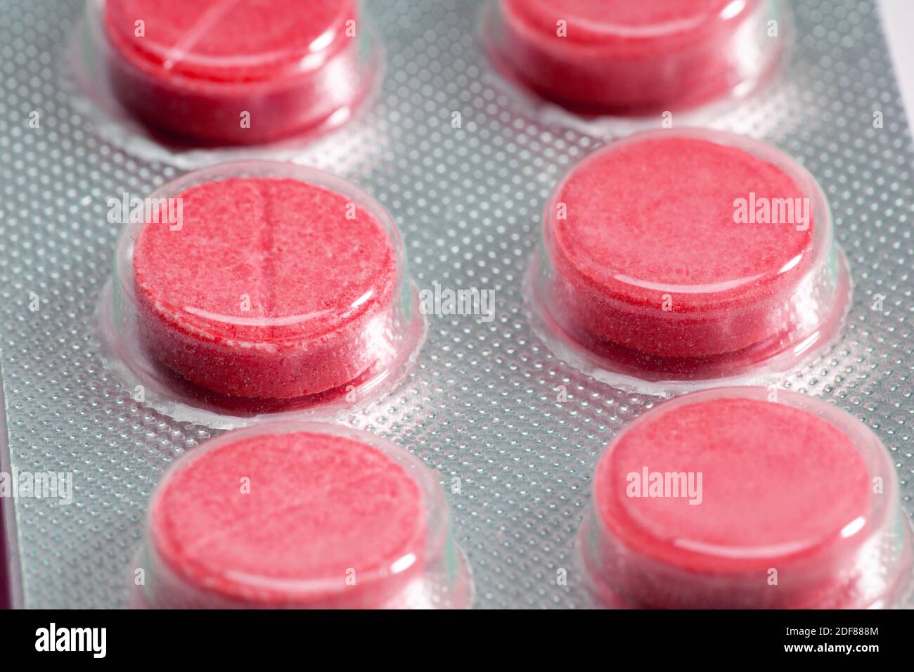 red tablets in a close-up blister Stock Photo - Alamy