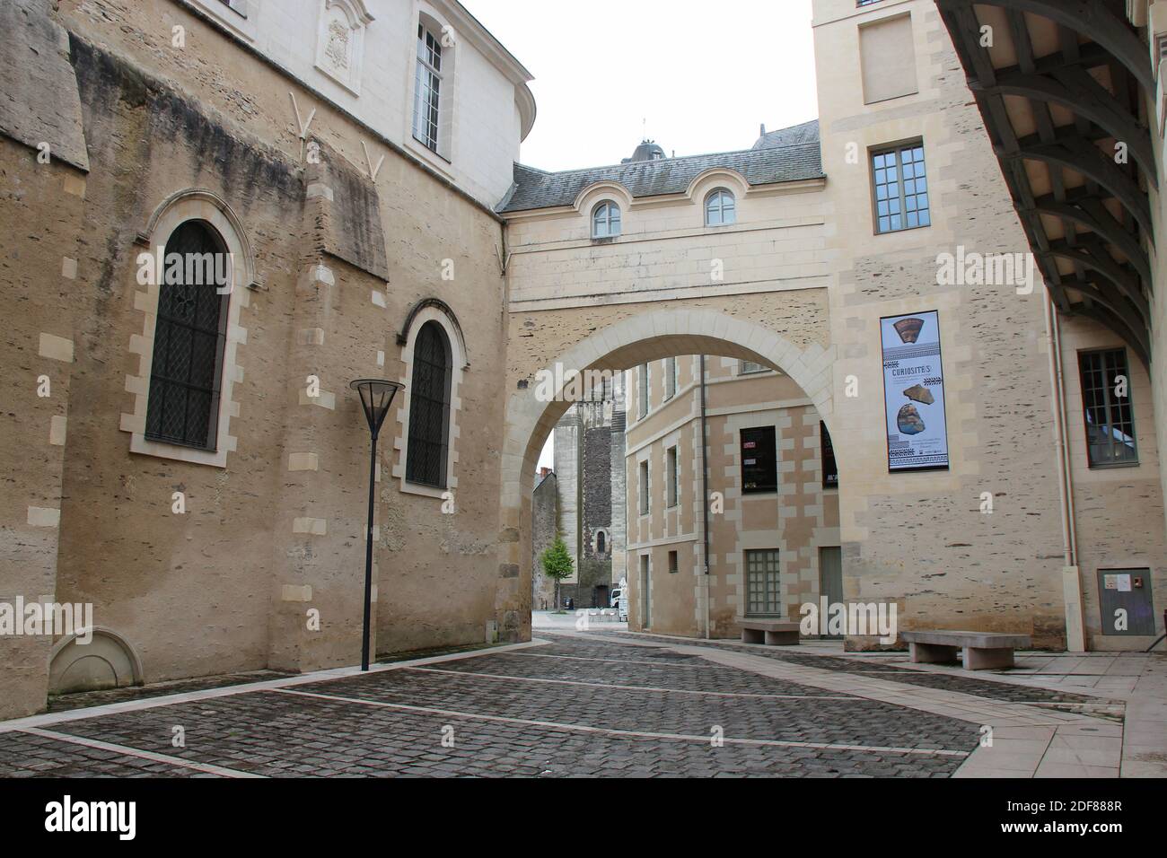 street, arch and stone buildings in angers in france Stock Photo - Alamy