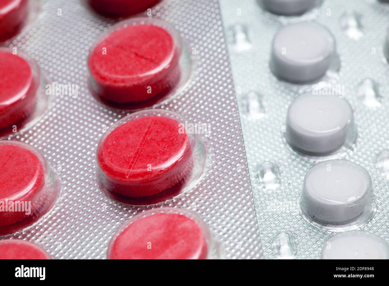 red tablets in a close-up blister Stock Photo - Alamy