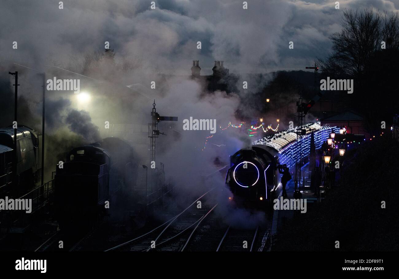 The S15 class steam locomotive 506 takes on water at Ropley station as ...