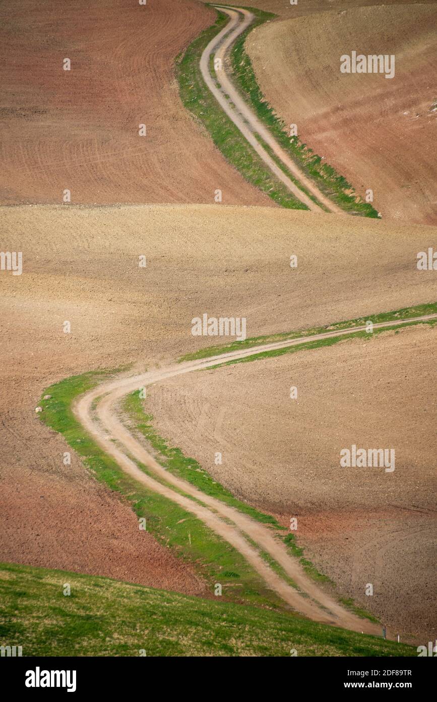 Winding Road Through Dry Landscape With Empty Fields In Andalucia Spain Stock Photo Alamy