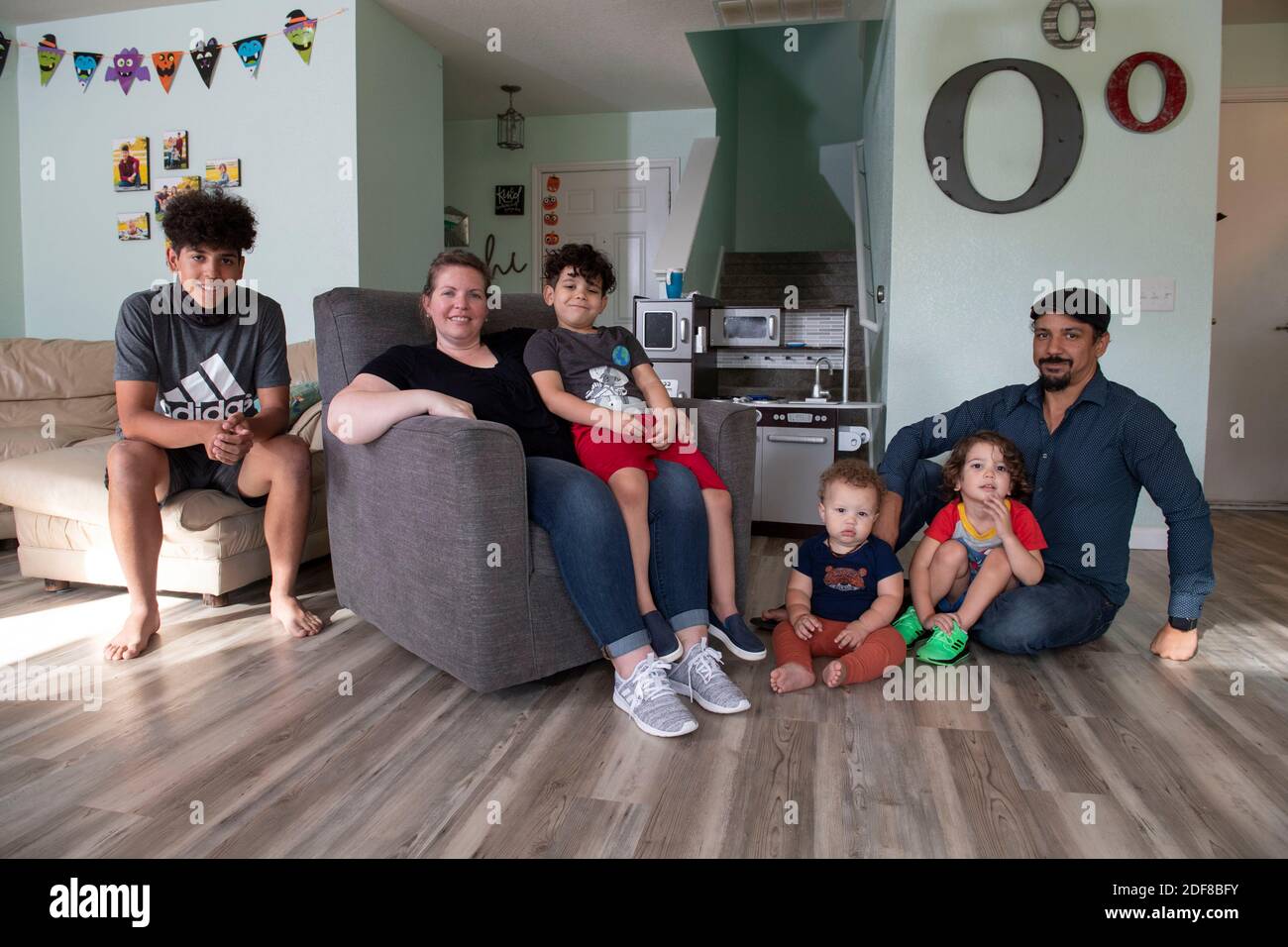 Parents Nicole and Brandon Overton and their family, Greeley (orange ...