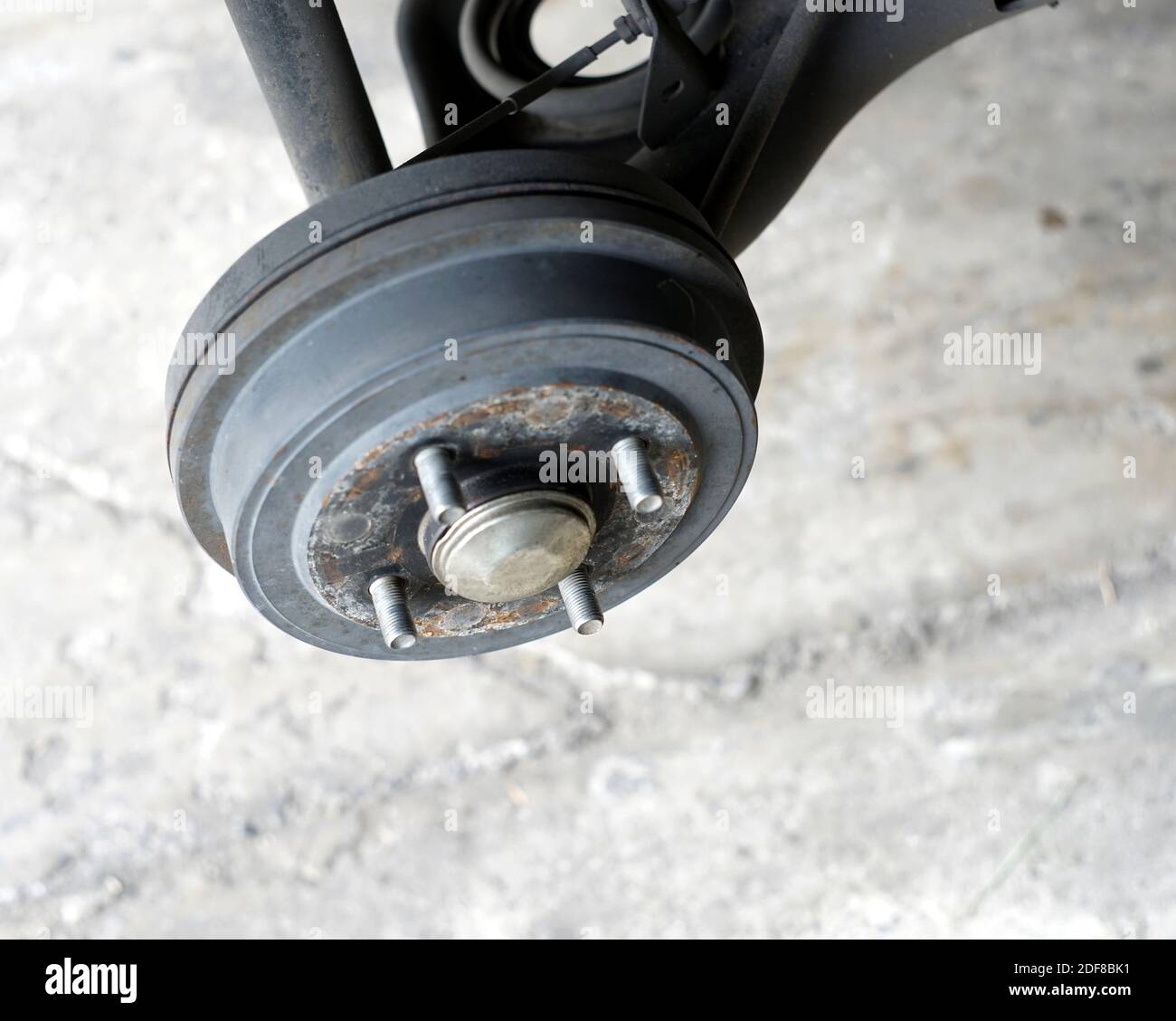 Close up top view a rear right wheel axle of the car Stock Photo - Alamy