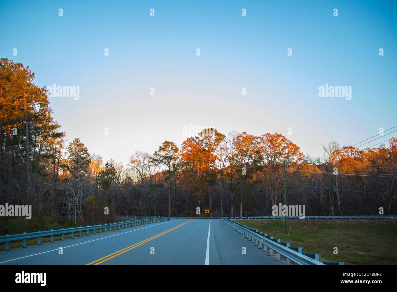 A dead end road with beautiful Fall colors and a empty road Stock Photo ...