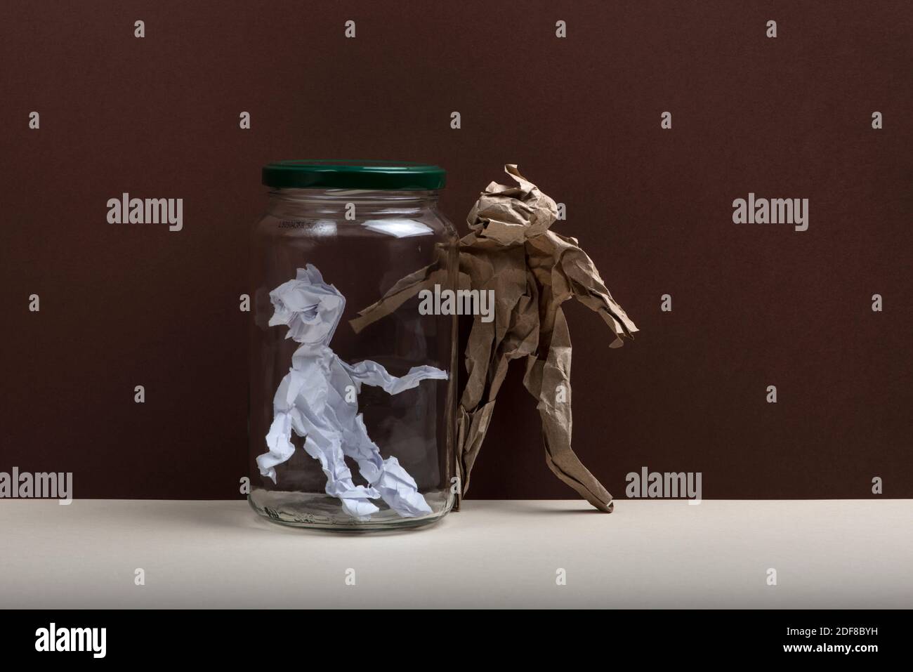 Human figures made from crumpled paper. Isolation concept Stock Photo ...