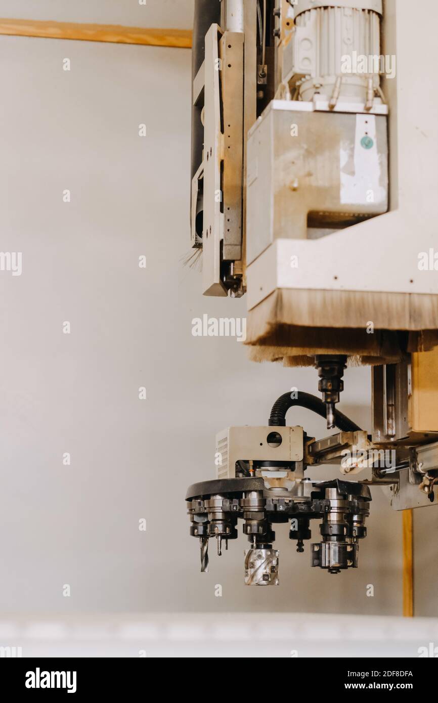 A vertical shot of chipboard milling machine Stock Photo - Alamy