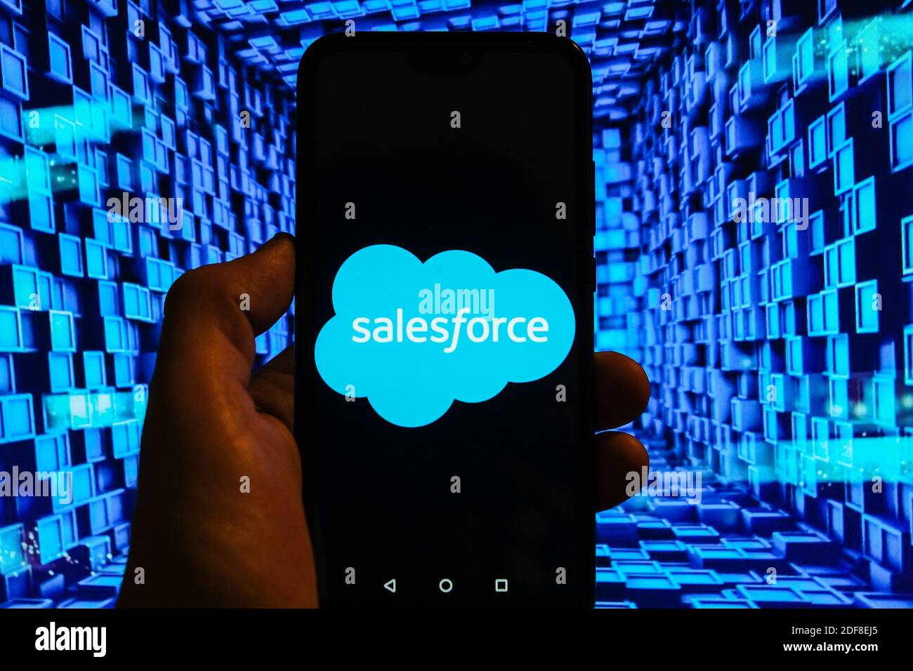 In this photo illustration a SalesForce logo is displayed on a ...