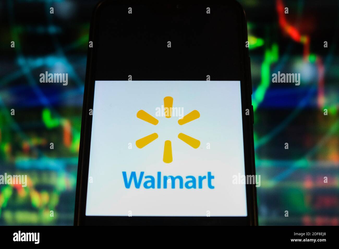 In this photo illustration a Walmart logo is displayed on a smartphone ...