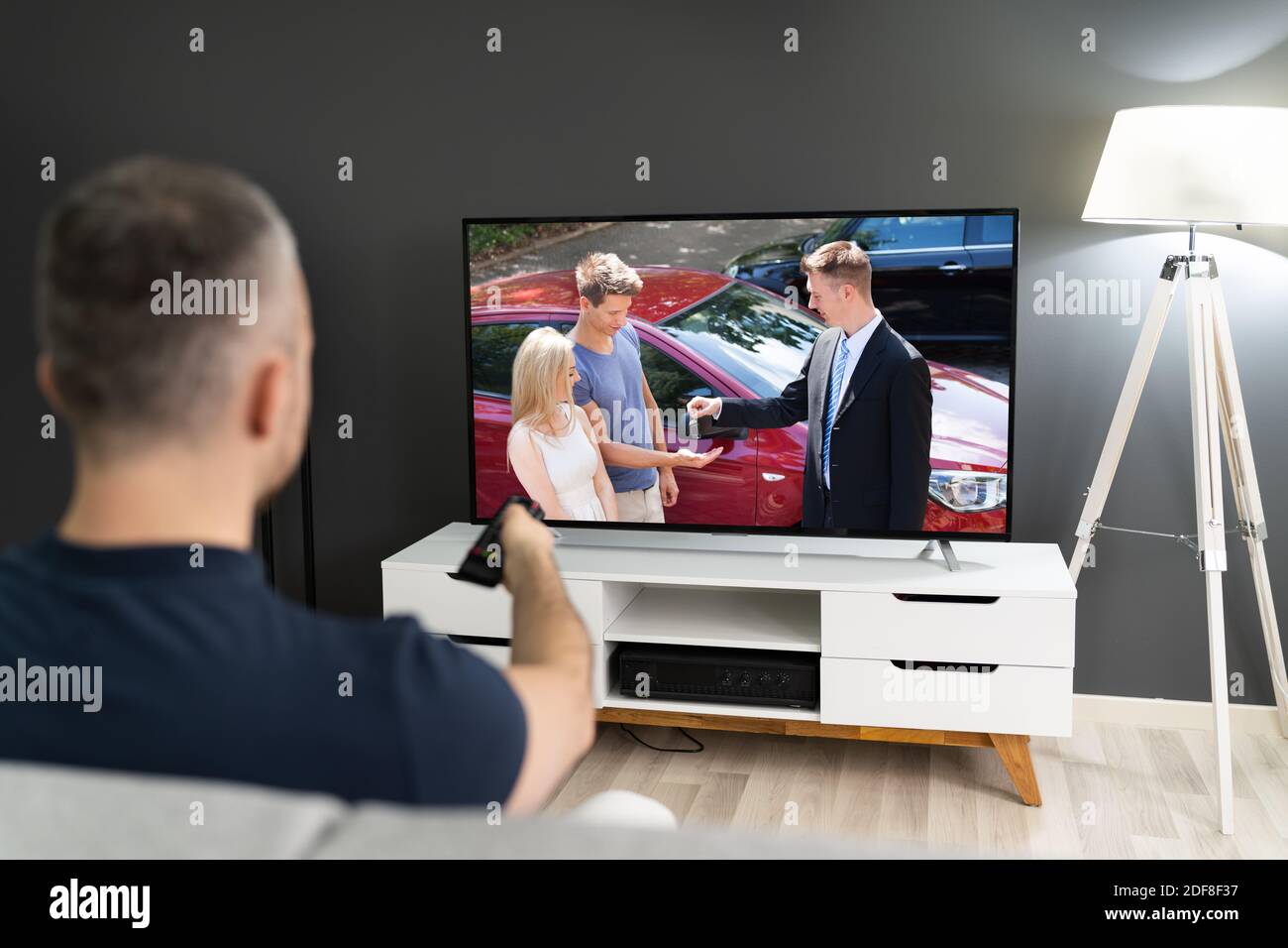Man Streaming And Watching Movie On TV Screen Stock Photo - Alamy
