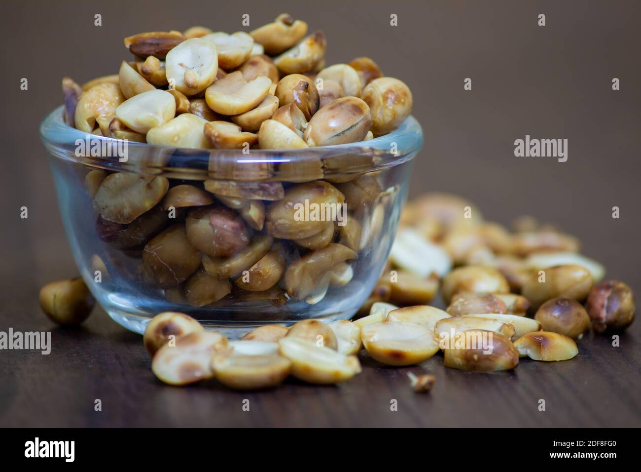 Roasted and peeled groundnut in a bowl. Healthy snack rich in protein ...