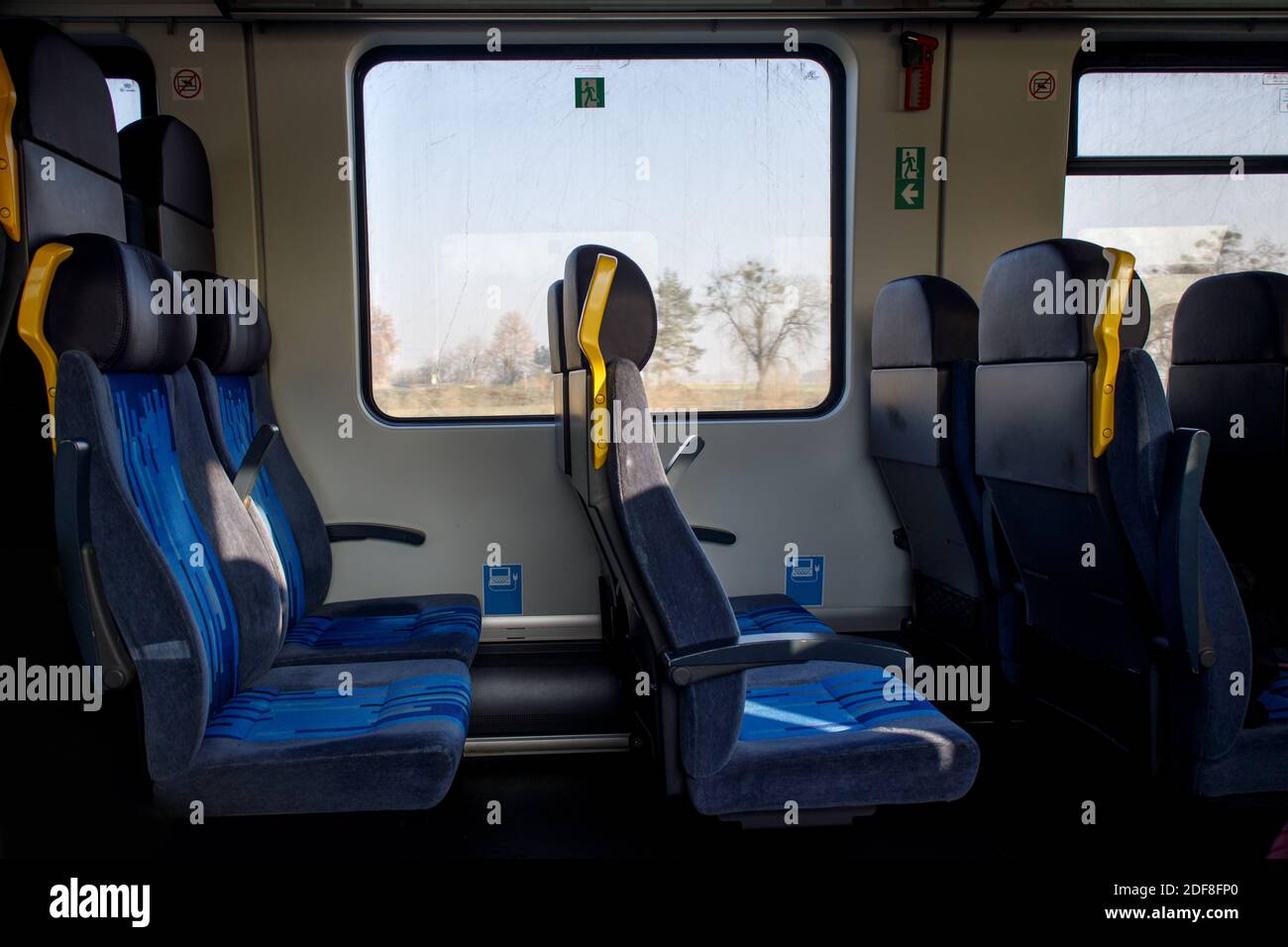 empty seats in a second class carriage on a train Stock Photo - Alamy