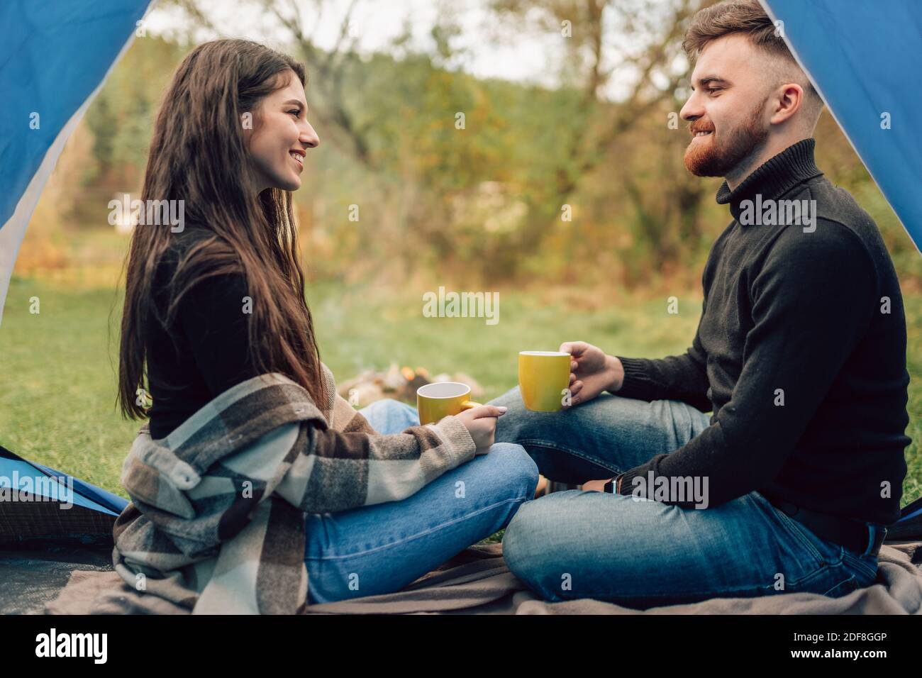 Couple drinking tea in forest hi-res stock photography and images - Alamy
