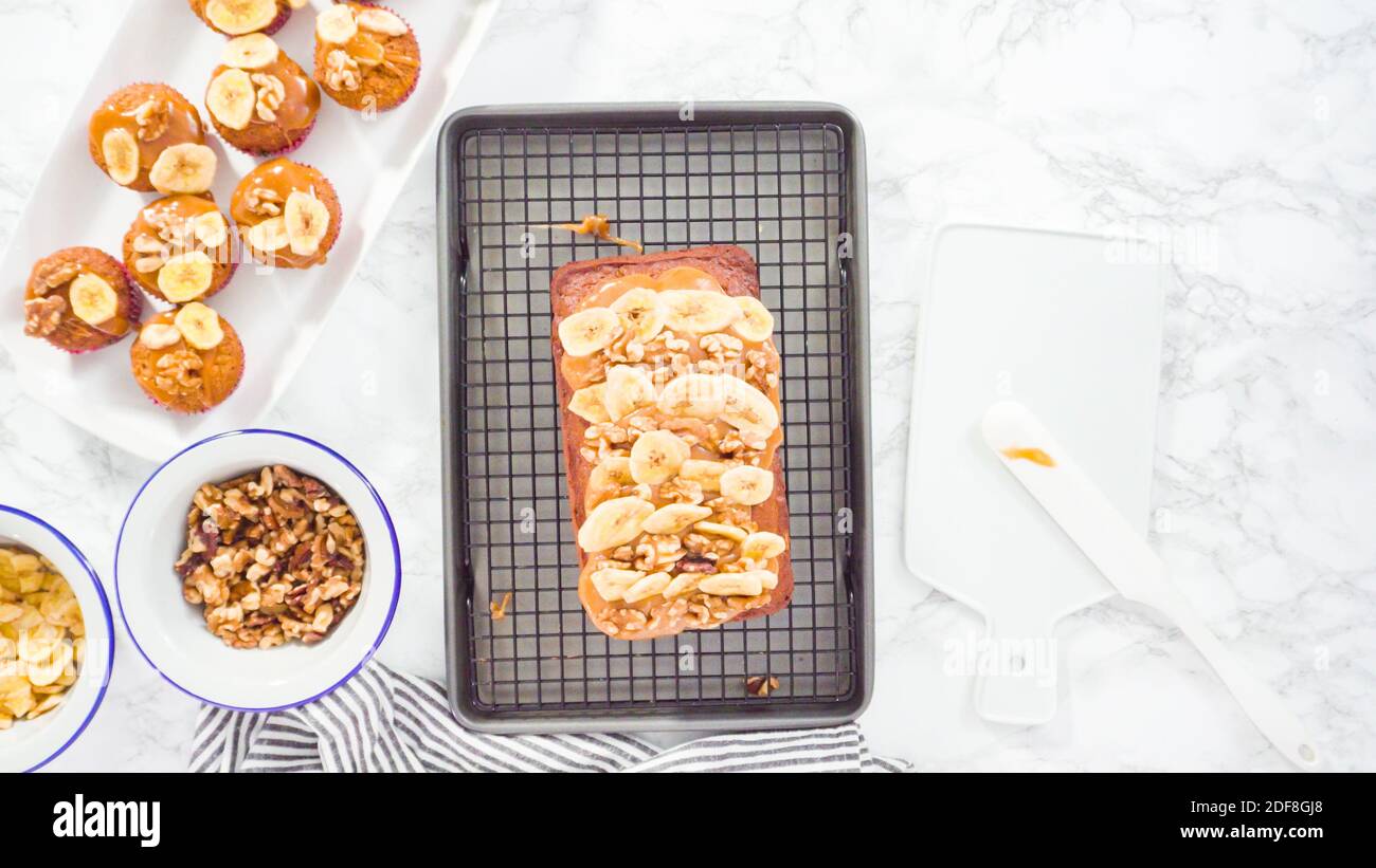 Flat lay. Step by step. Garnishing banana bread loaf with homemade ...