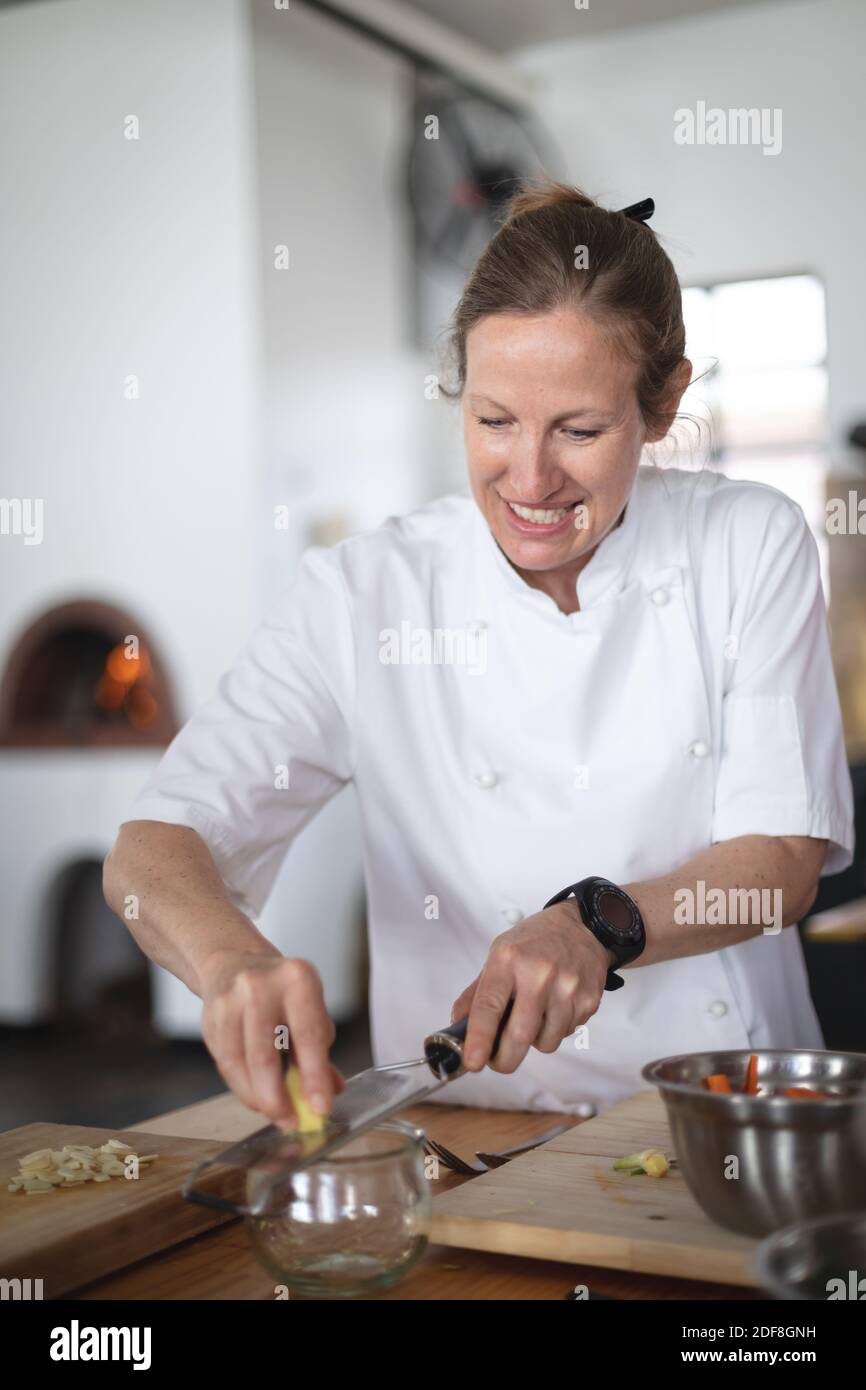 Beautiful female chef cooking home hi-res stock photography and images ...