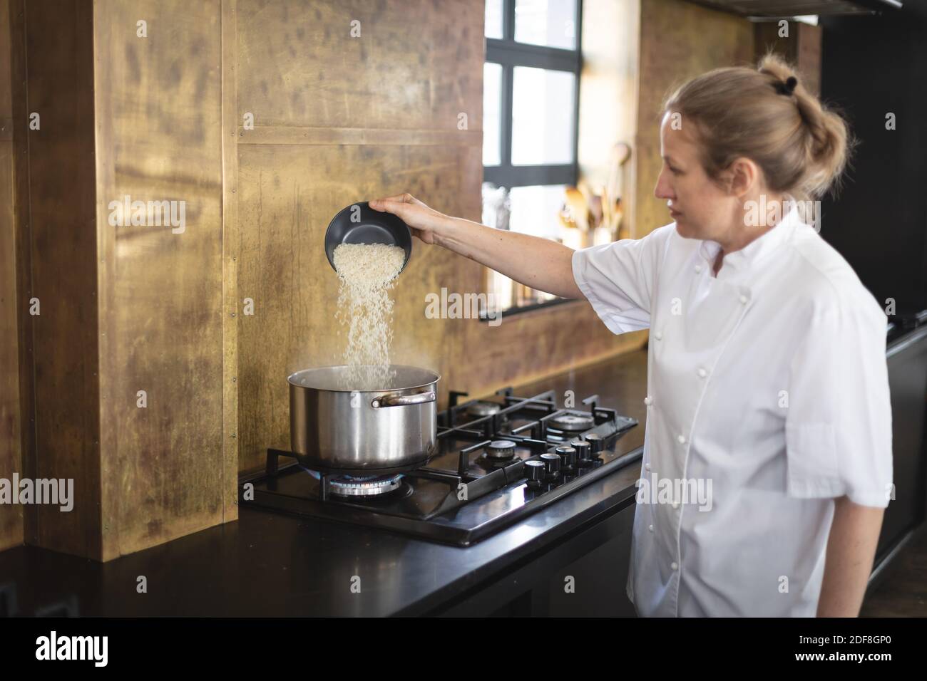 Beautiful female chef hi-res stock photography and images - Alamy