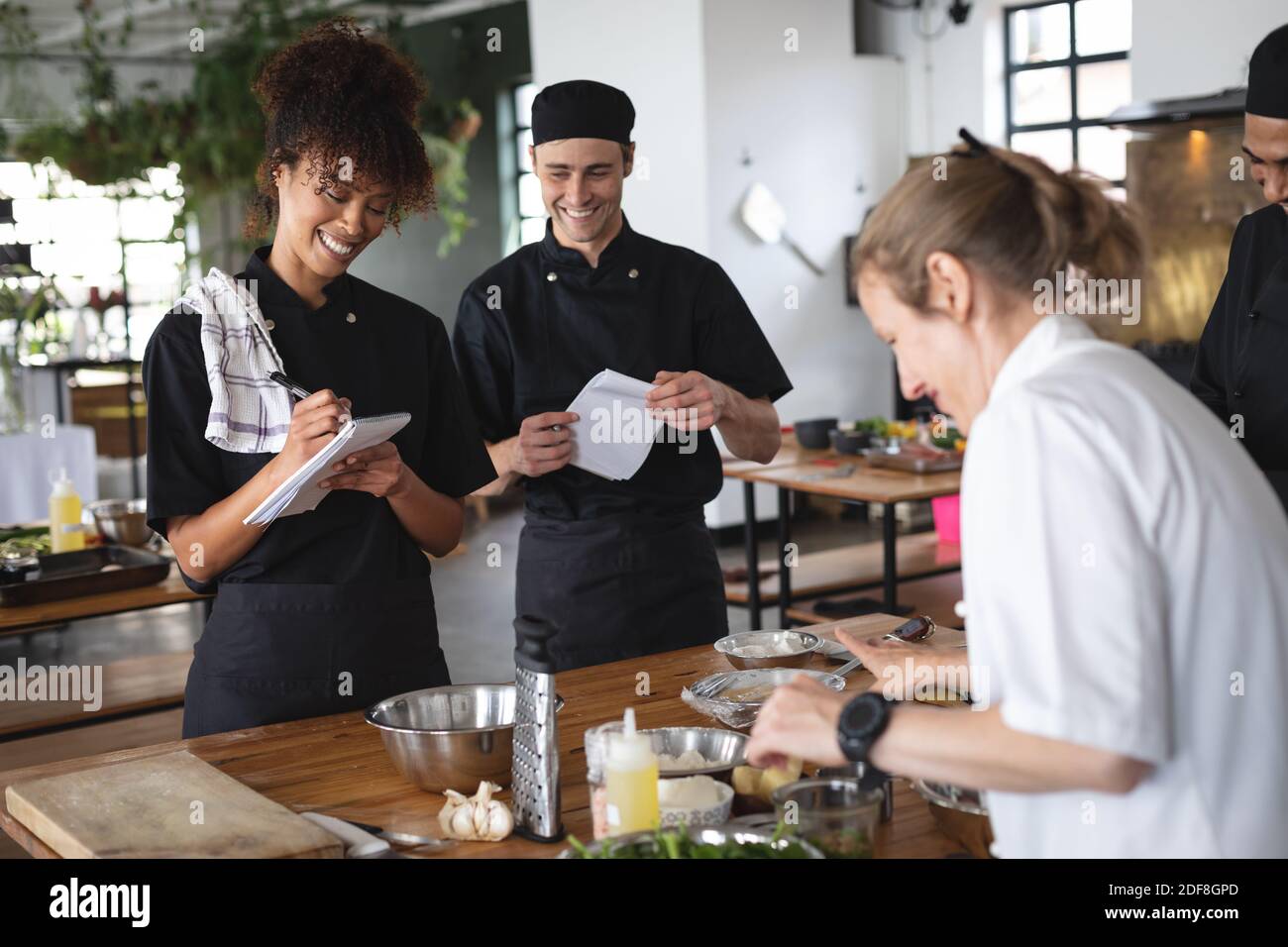 Female chef cooking tasty hi-res stock photography and images - Alamy