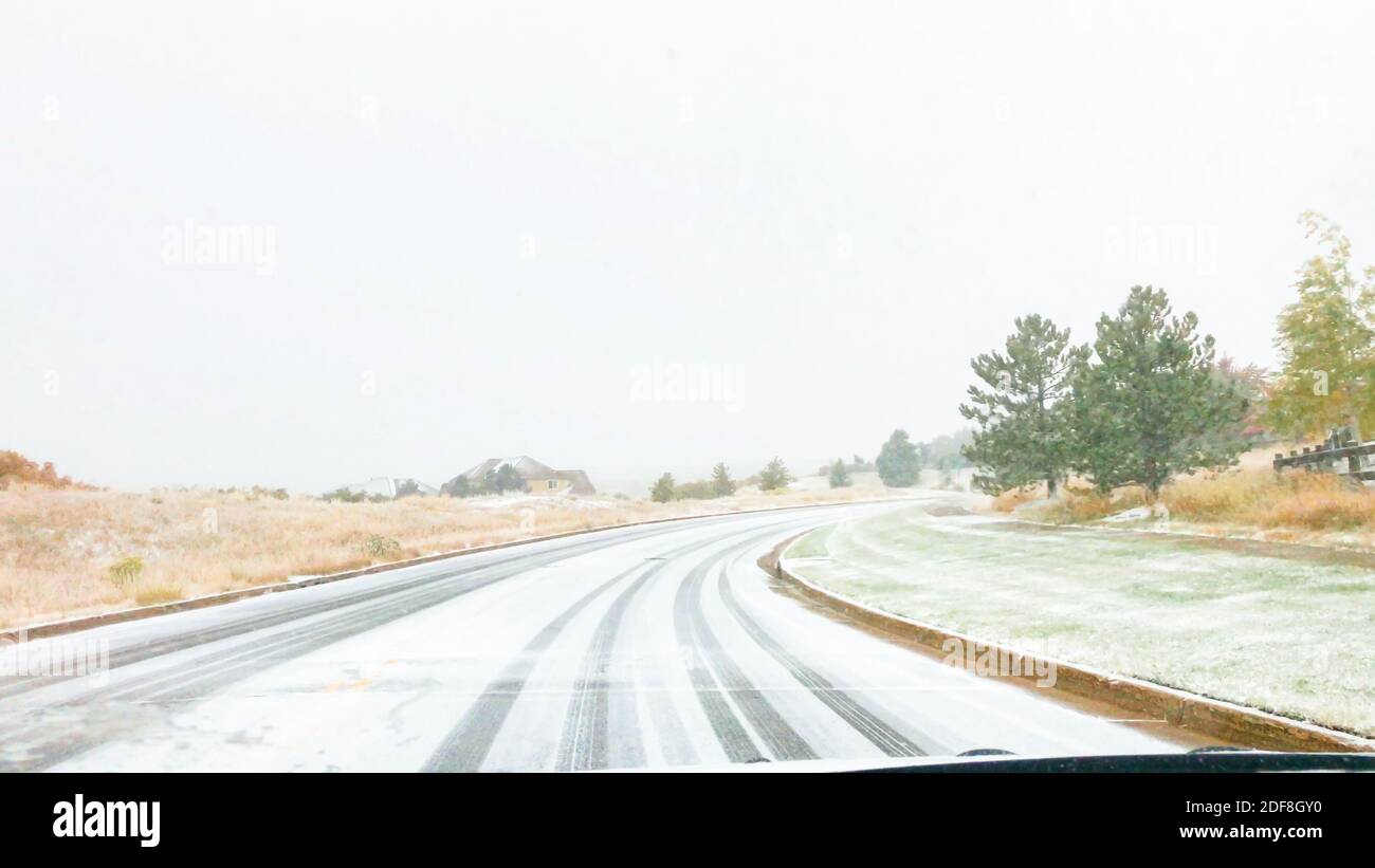 Driving in typical North American suburbs during the first snowstorm of ...