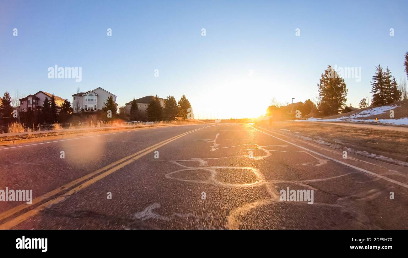 Driving on typical paved roads in a suburban upscale residential ...