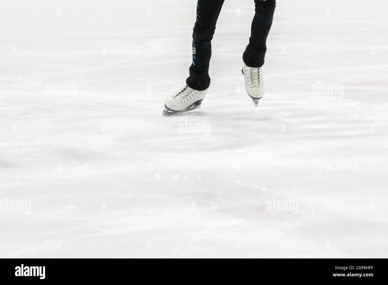 View of figure skater feet at the figure skating practice Stock Photo ...