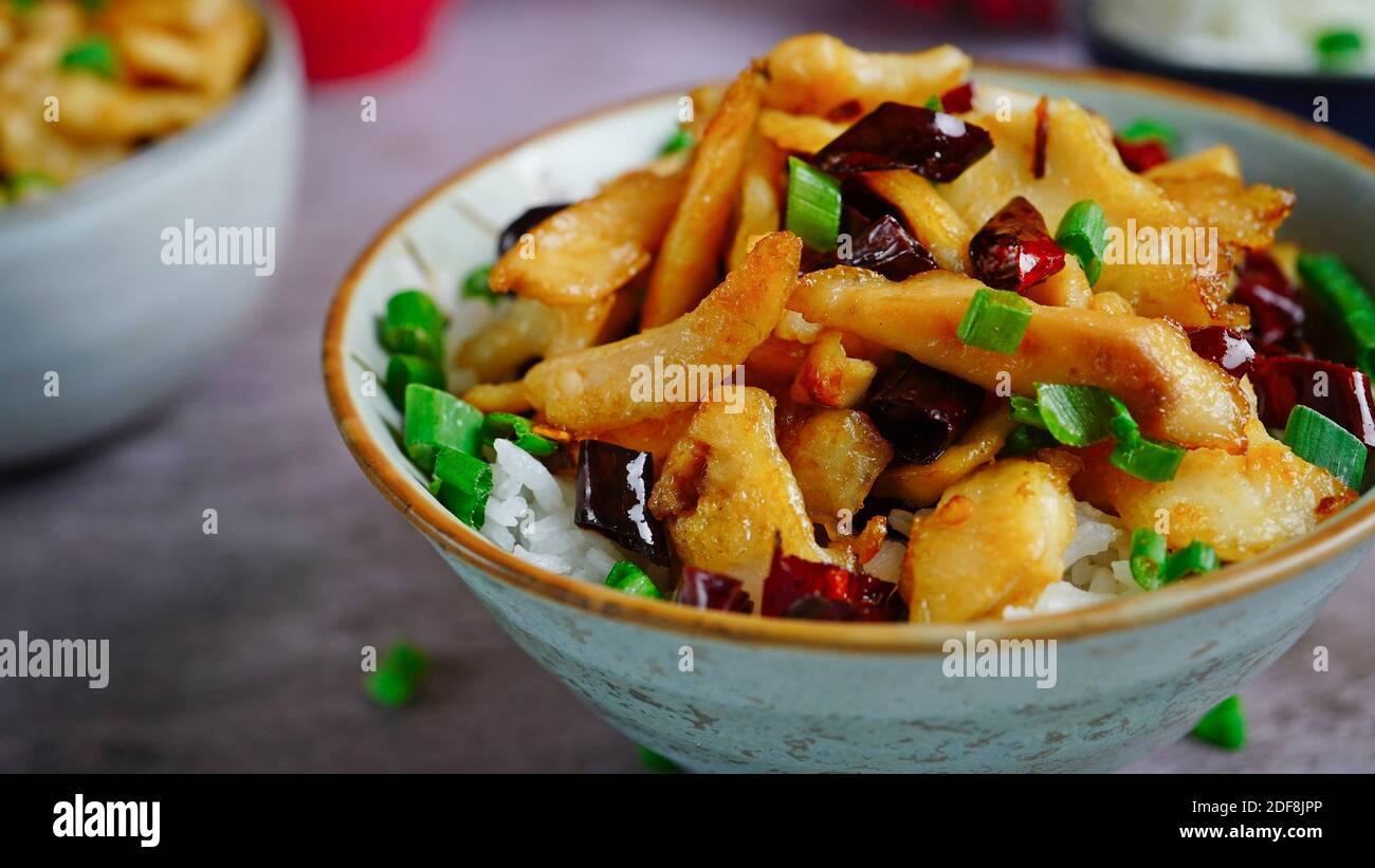 Spicy Fish with dry red chillies and schezwan peppercorn served with ...