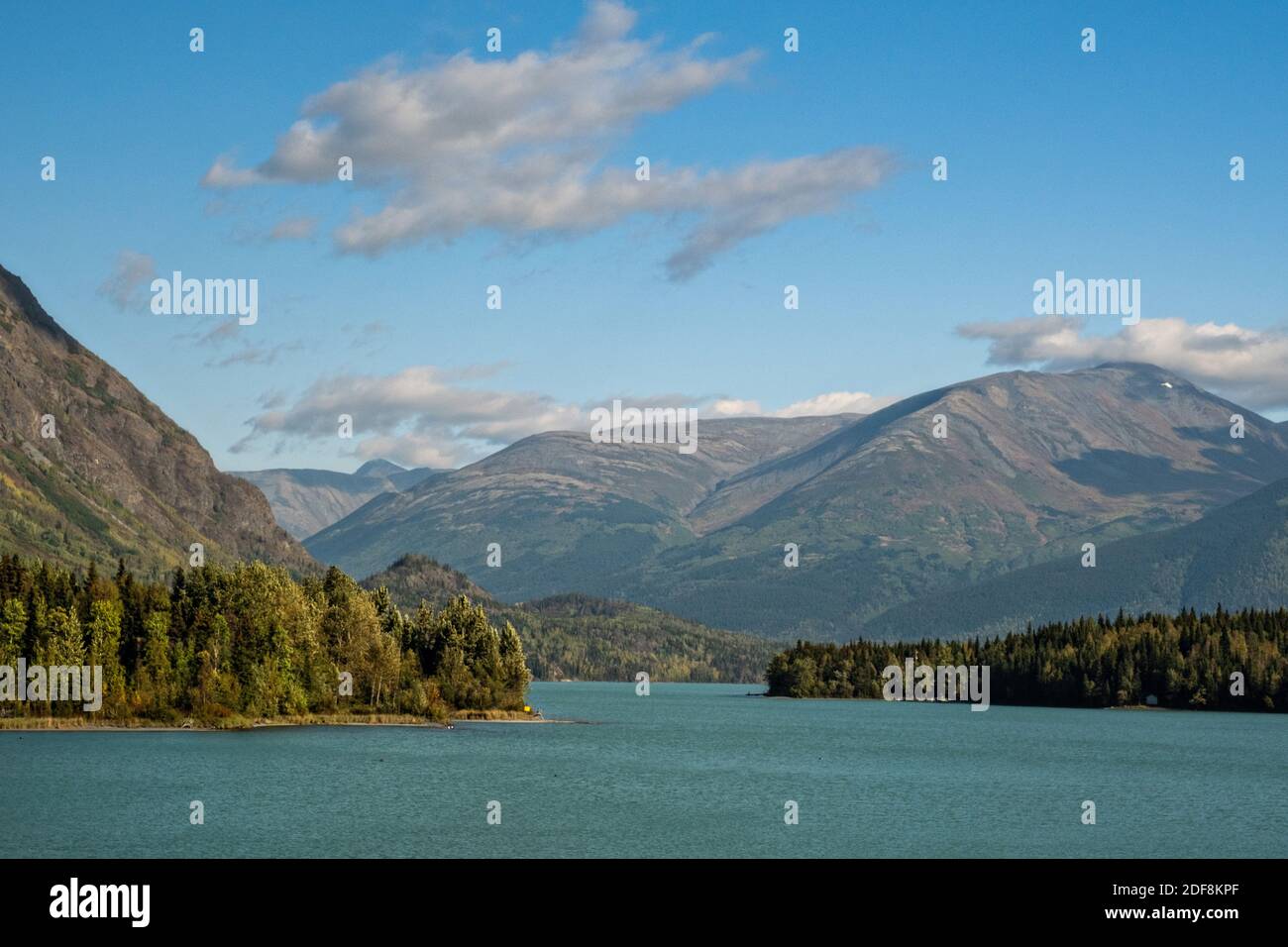 The clear mountain waters of Kenai Lake and mountains at Chugach ...