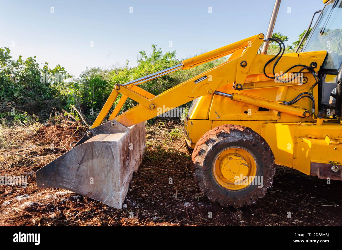 Bulldozer Bucket Turning Down Stock Photo - Alamy