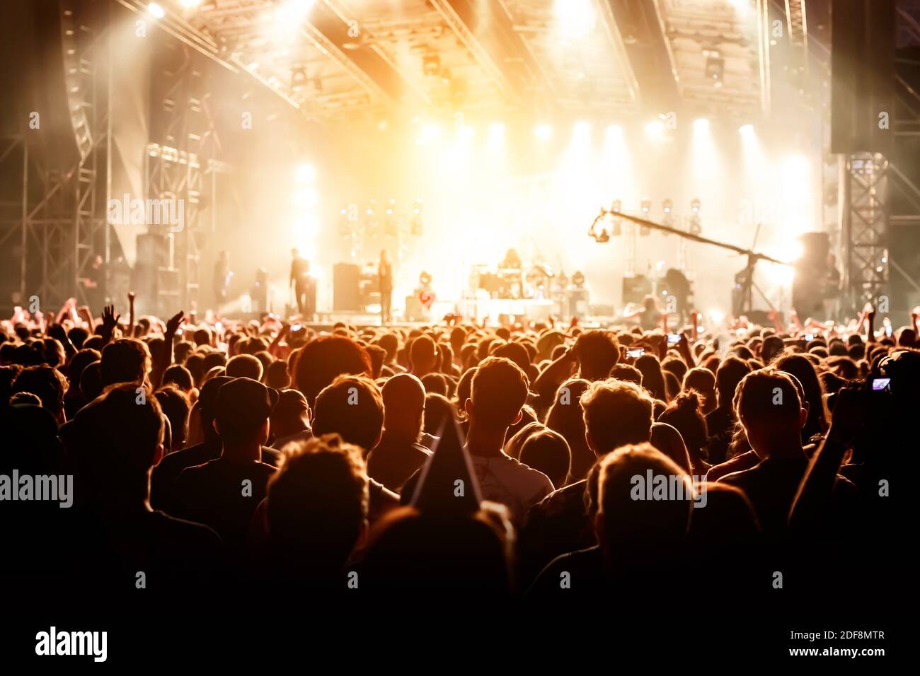 Silhouettes of concert crowd. Event with a lot of people. Big club ...