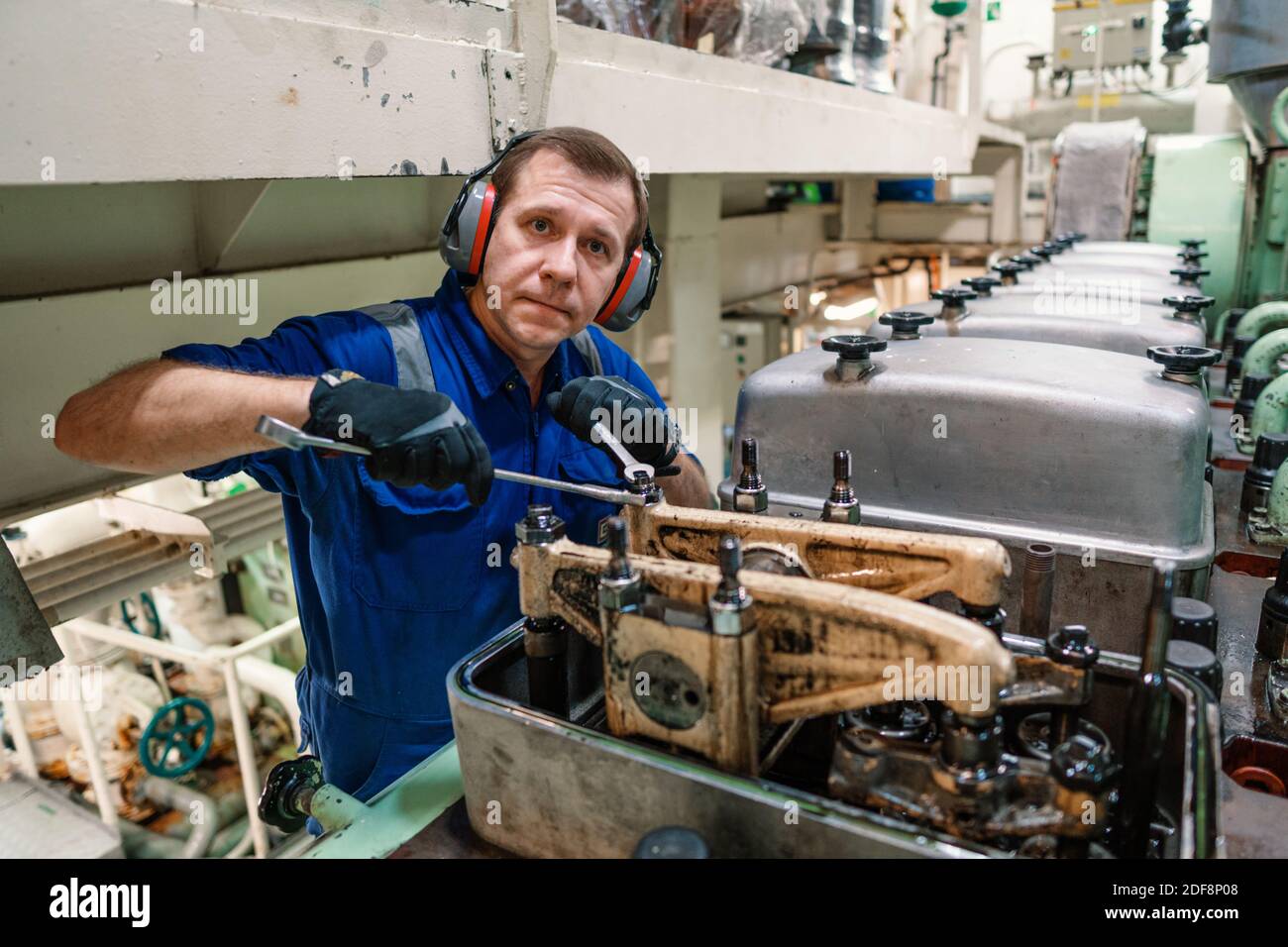 Marine engineer officer controlling vessel enginesand propulsion in ...