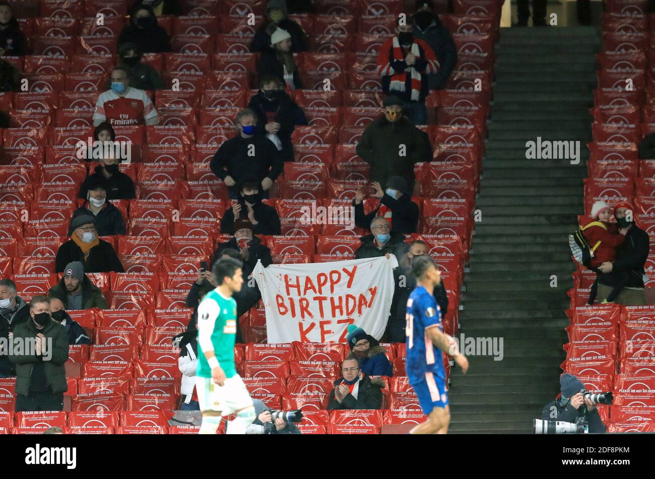 Arsenal fans hold up banner hi-res stock photography and images - Alamy