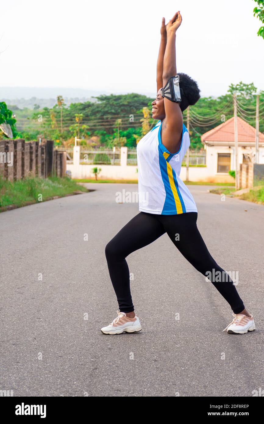 African lady sunlight hi-res stock photography and images - Alamy