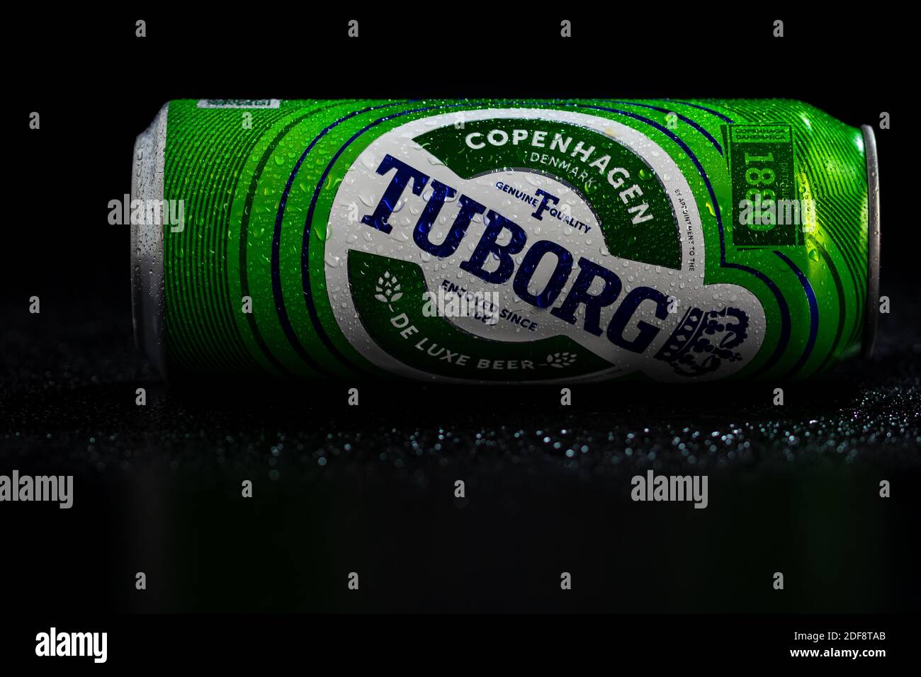 Condensation water droplets on Tuborg beer can isolated on black ...