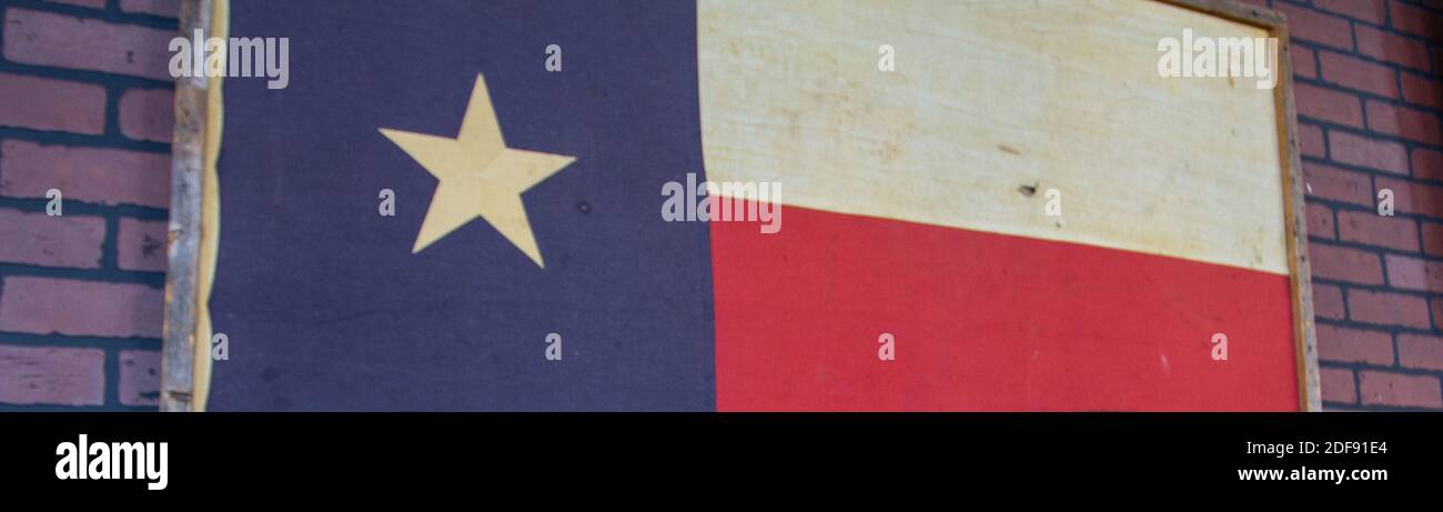 Texas Flag Against a Brick Wall Stock Photo - Alamy