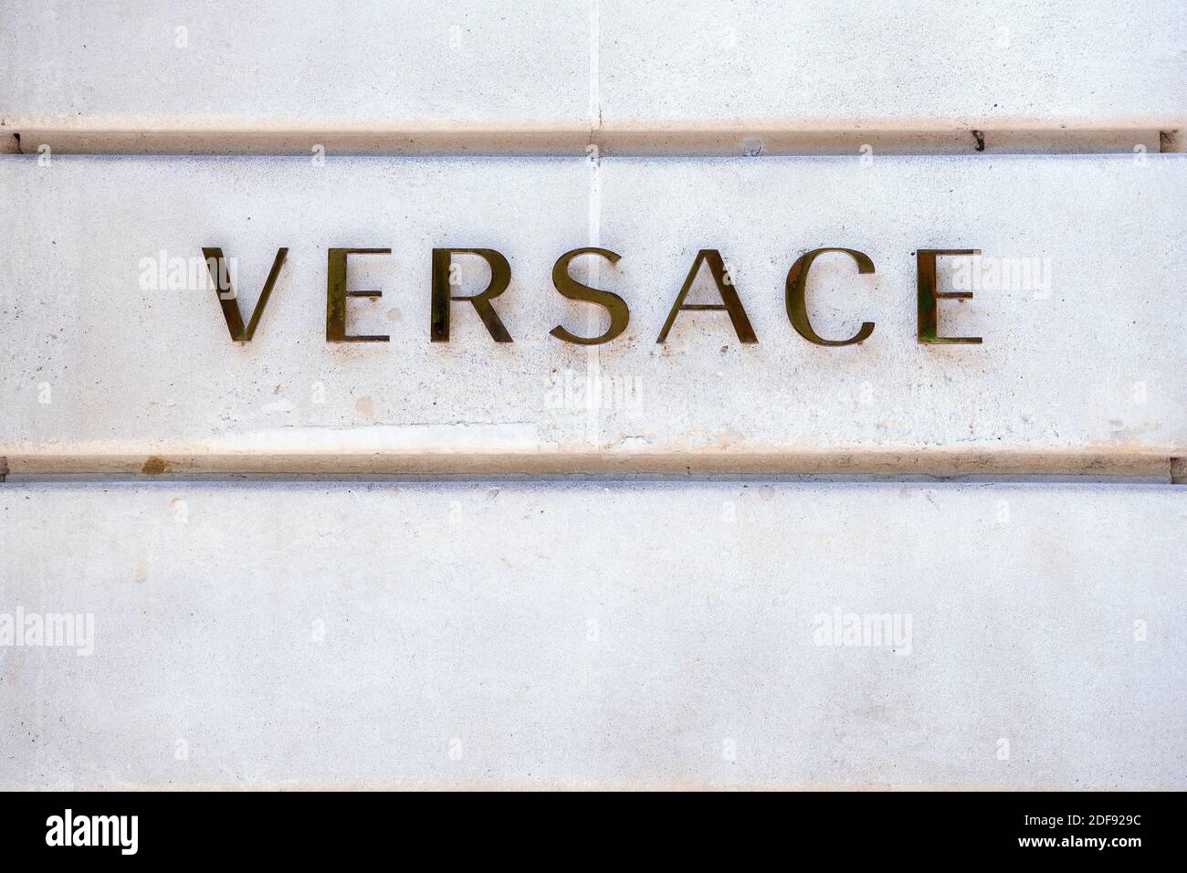 A shop sign of Versace in Paris, on April 8, 2020 in Paris, France ...