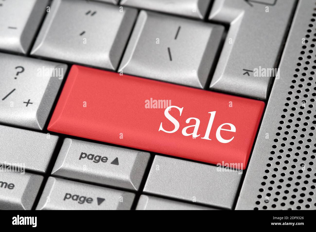 Computer keyboard key colored red labeled with the word Sale Stock ...
