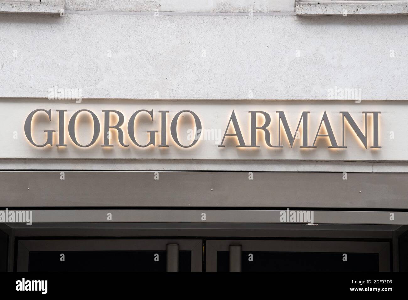 A shop sign of Giorgio Armani in Paris, on April 9, 2020 in Paris ...