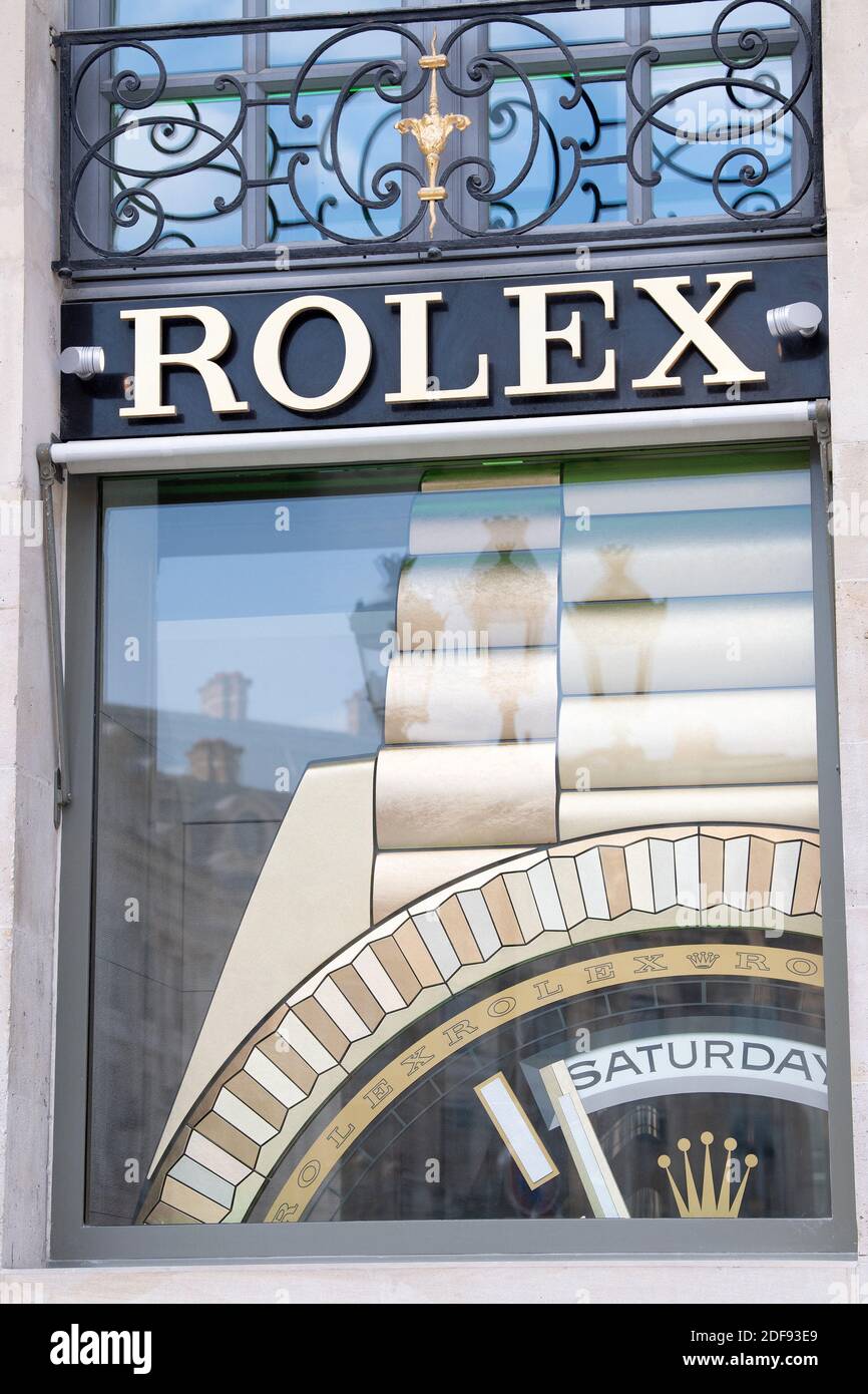 A shop sign of Rolex in Paris, on April 9, 2020 in Paris, France. Photo ...