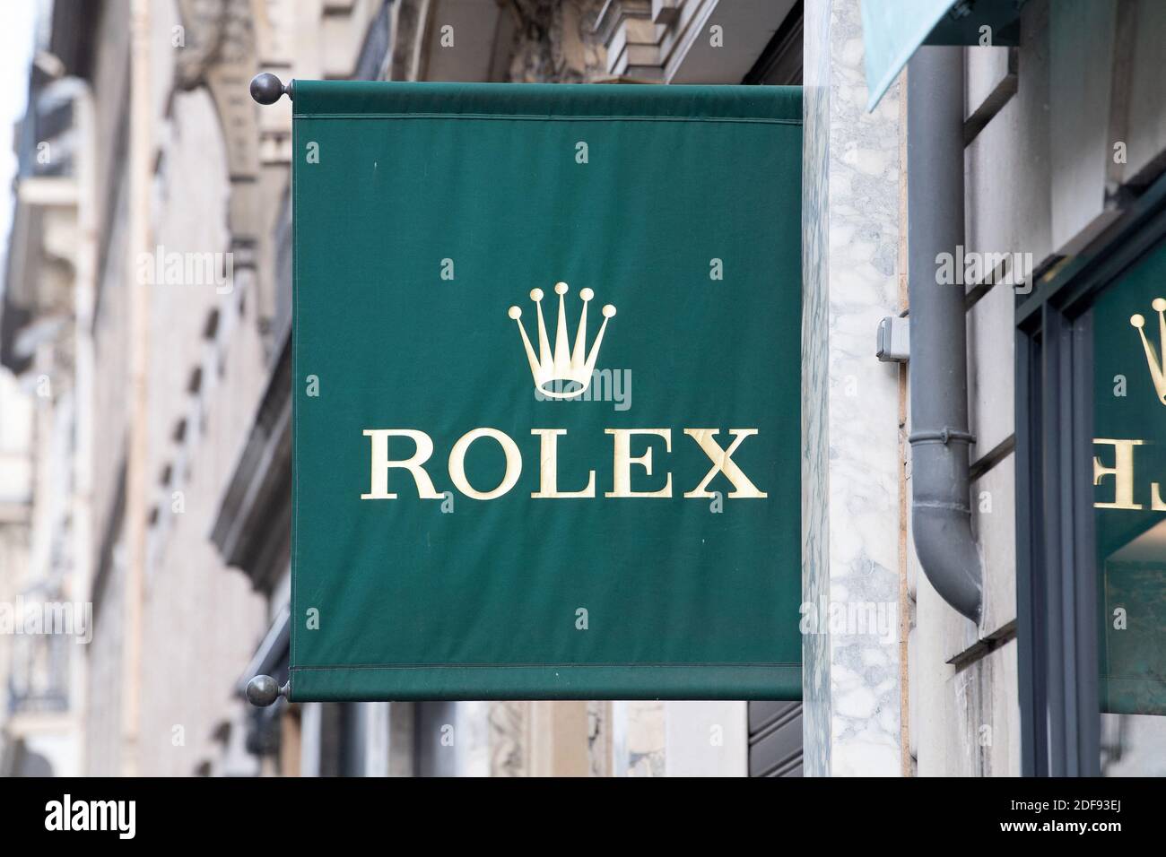 A shop sign of Rolex in Paris, on April 9, 2020 in Paris, France. Photo ...