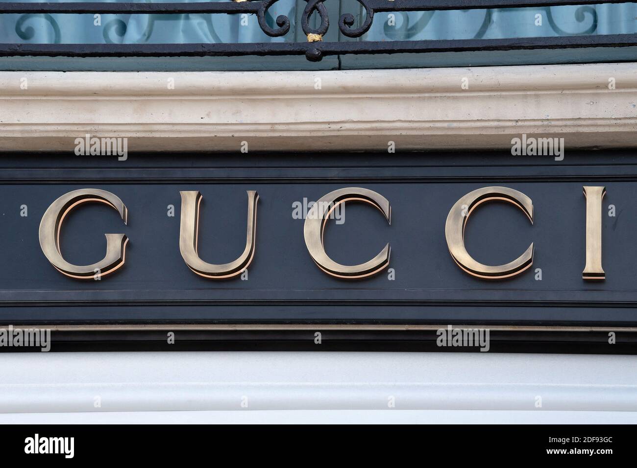A shop sign of Gucci in Paris, on April 9, 2020 in Paris, France. Photo ...