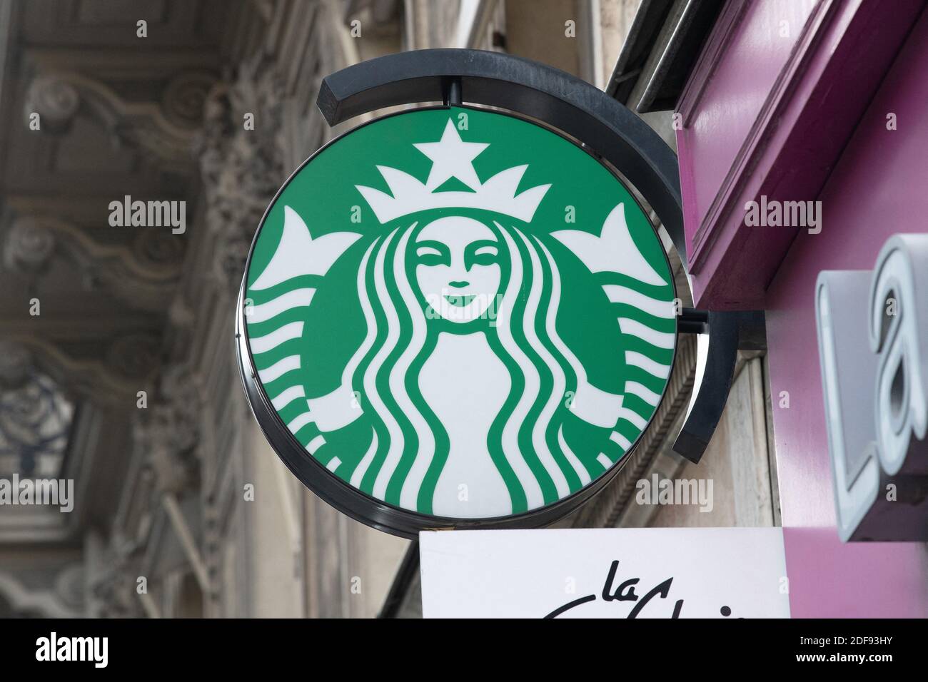 A shop sign of Starbucks Coffee in Paris, on April 9, 2020 in Paris ...