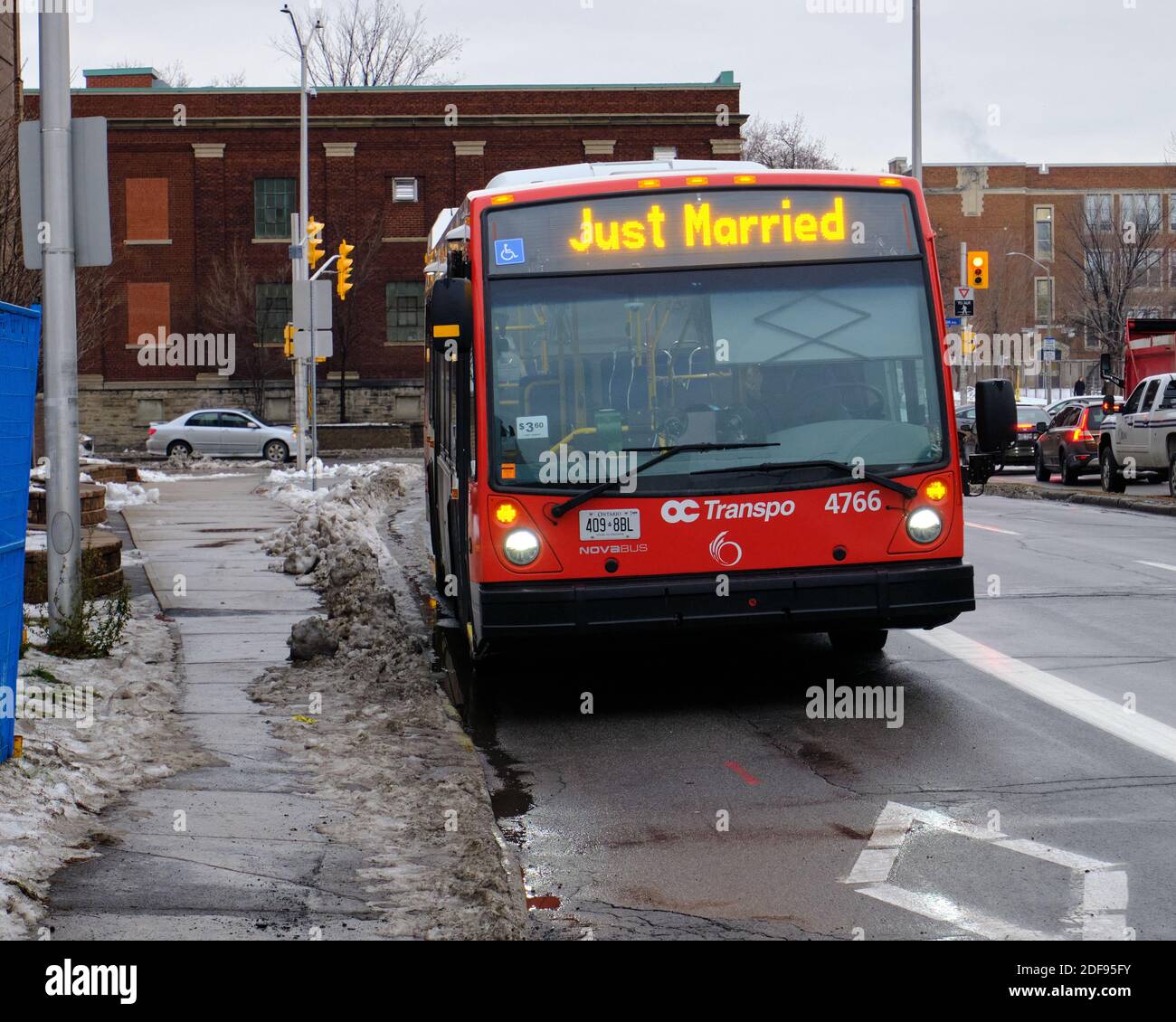 Ottawa transit bus stop on side of road with message display reading ...