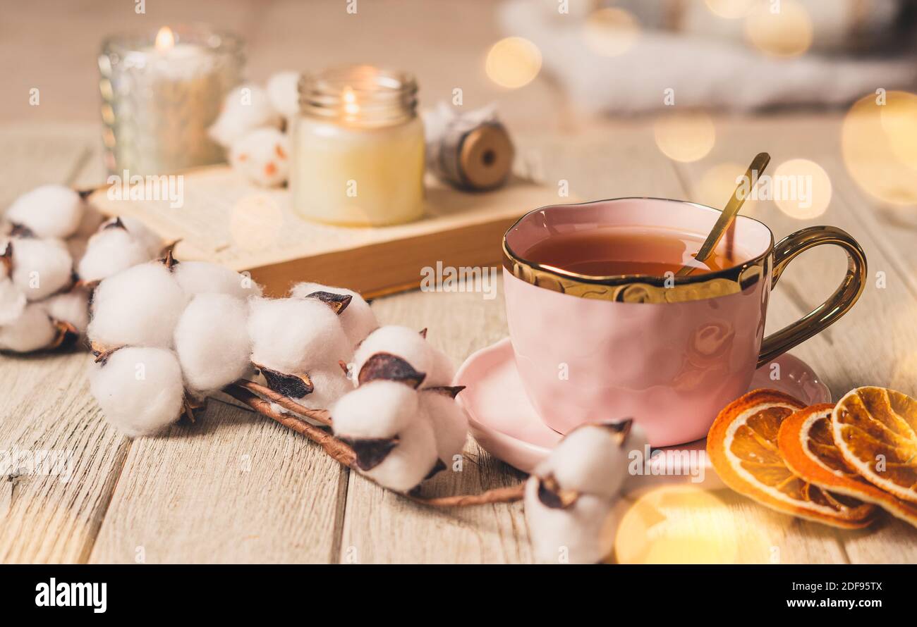 Details of still life in the home interior of living room. Sweater, cup ...